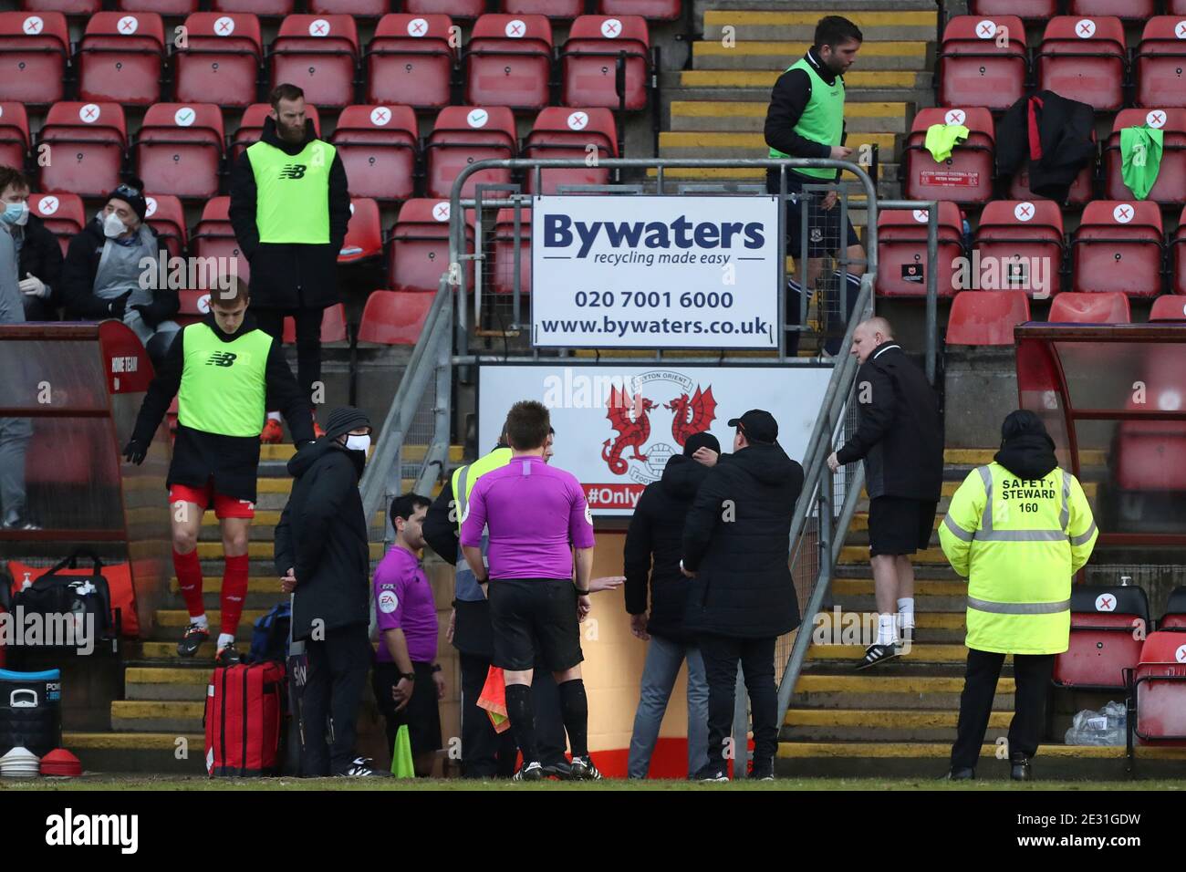 Match Referee Brett Huxtable stands outside the tunnel while a ...