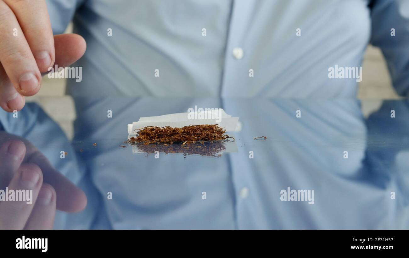 Handmade cigarette using paper hi-res stock photography and images - Alamy