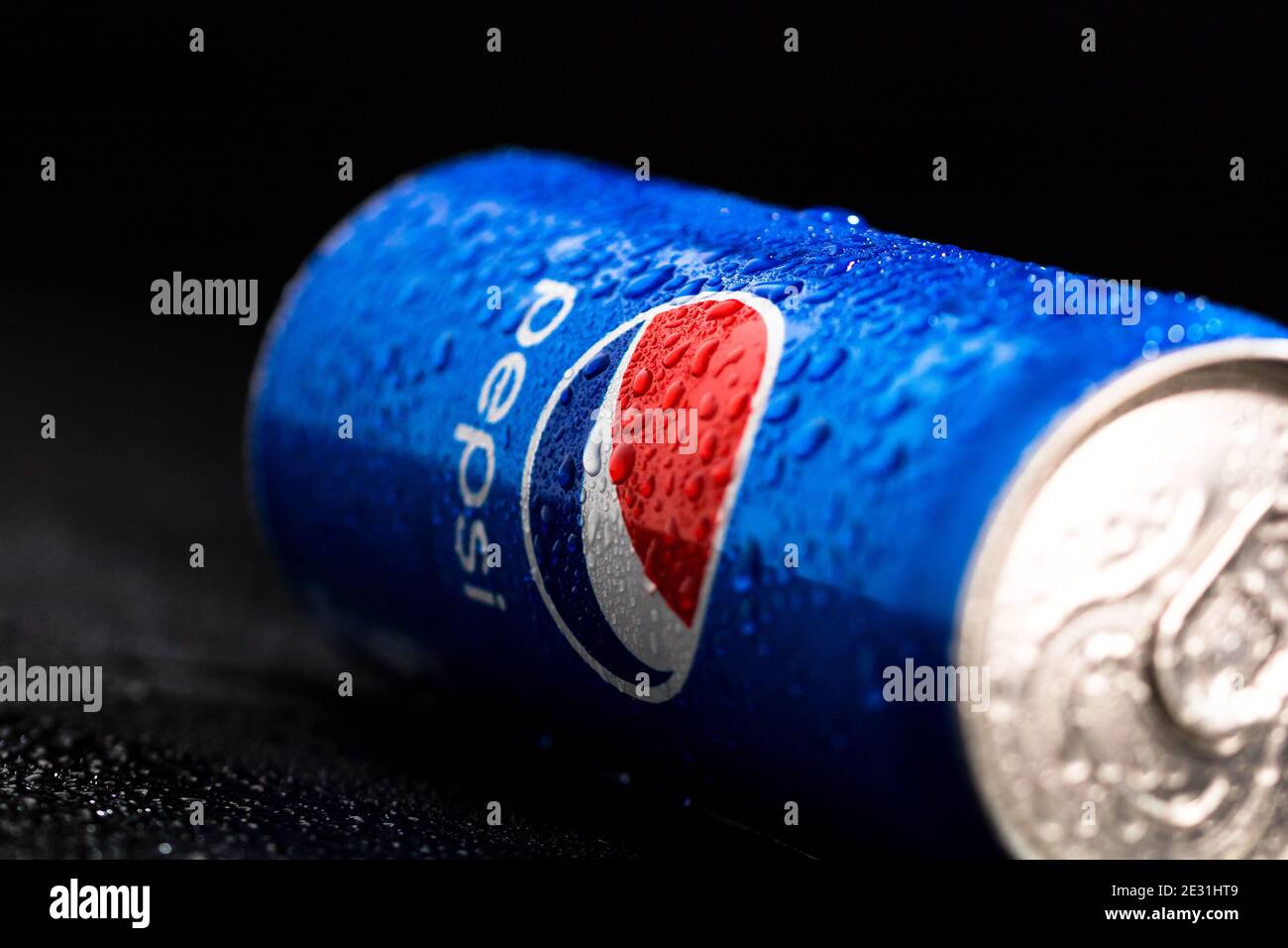 Editorial photo of Pepsi can with water droplets on black background ...