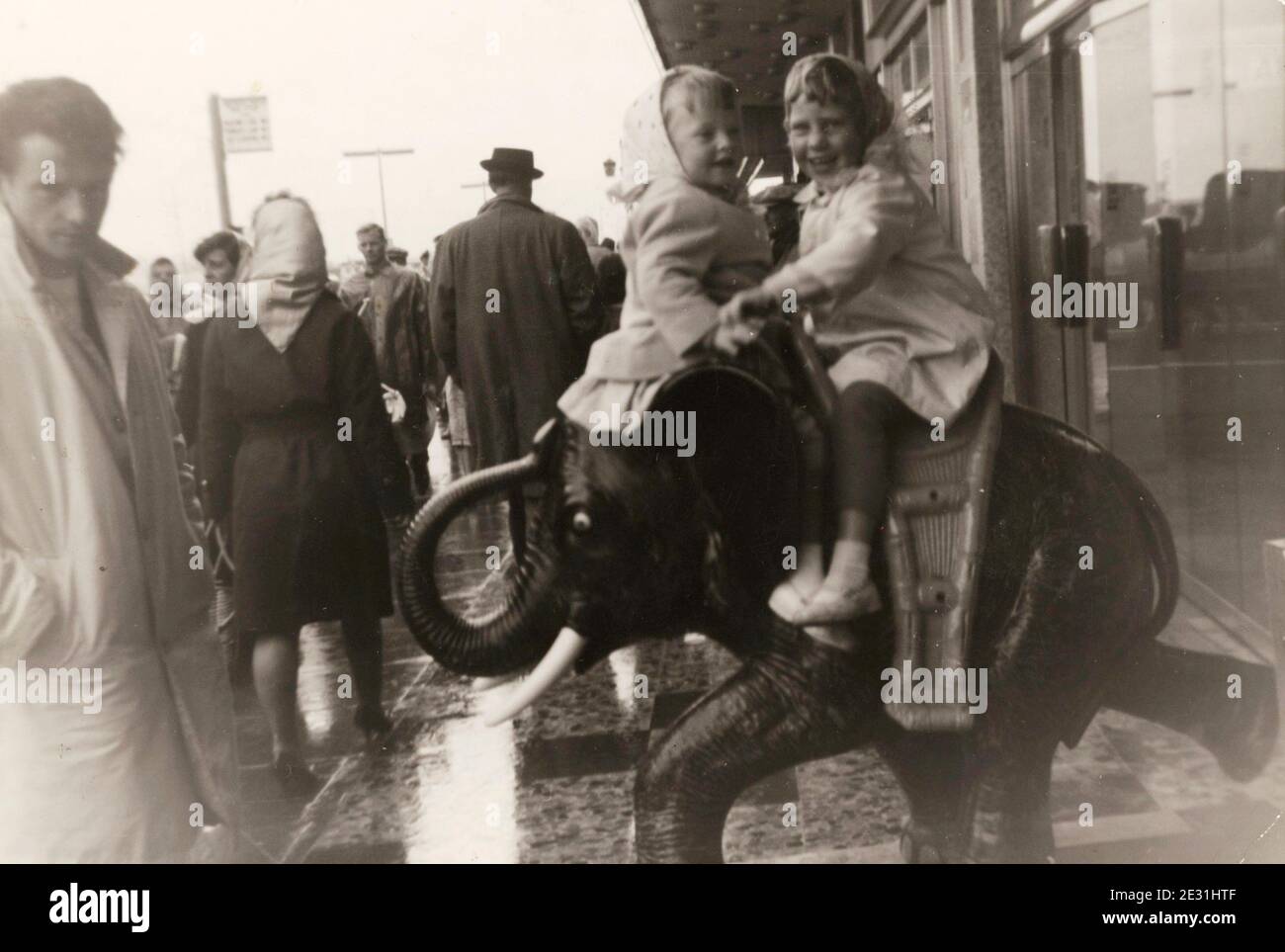 Two girls coin operated arcade ride in Blackpool, Lancashire, UK Stock ...