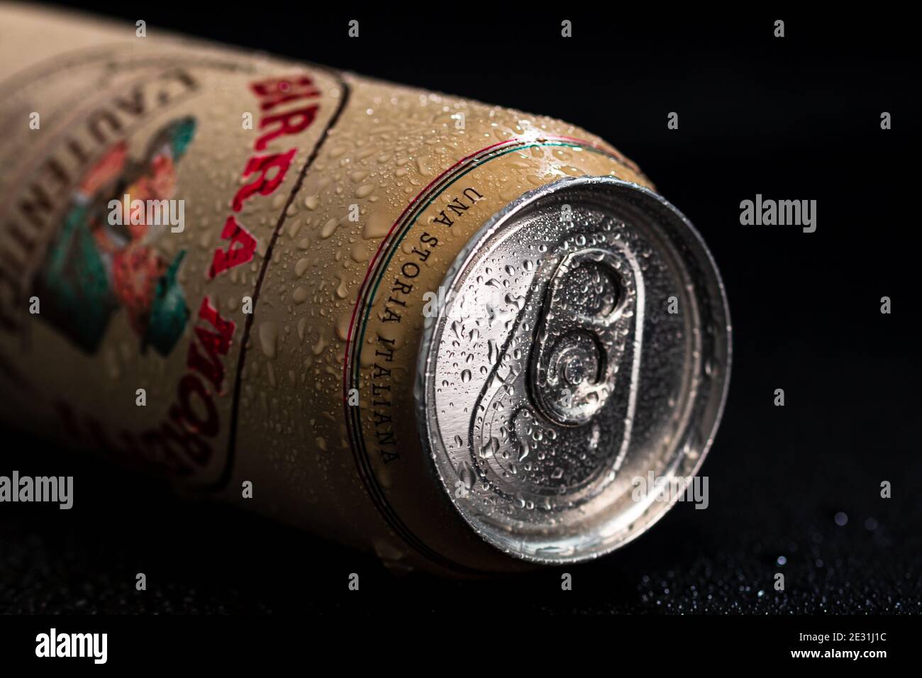 Birra Moretti, a premium lager beer with water droplets on black ...