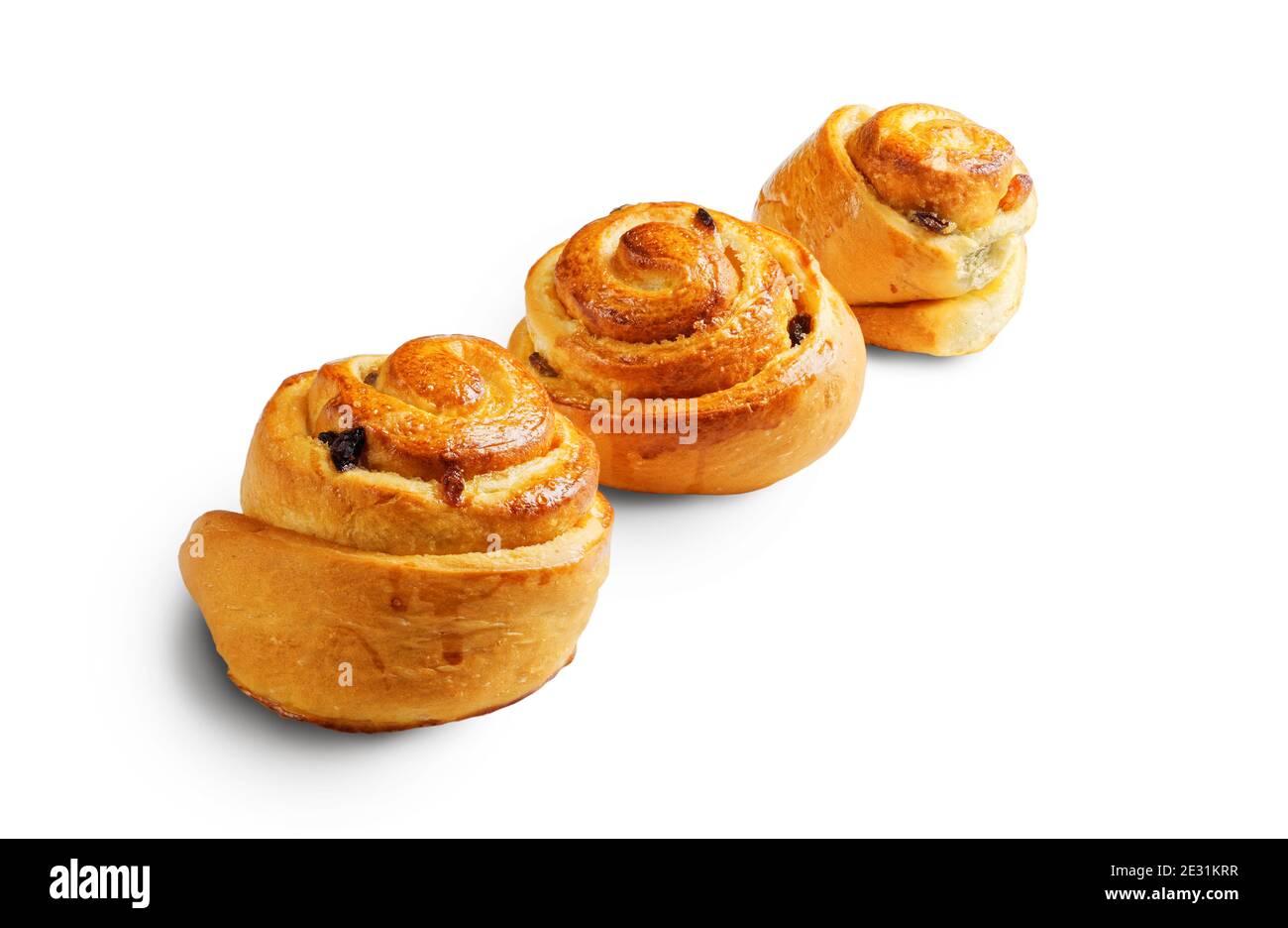 Three buns with raisin isolated on white. Angle view. Clipping path ...