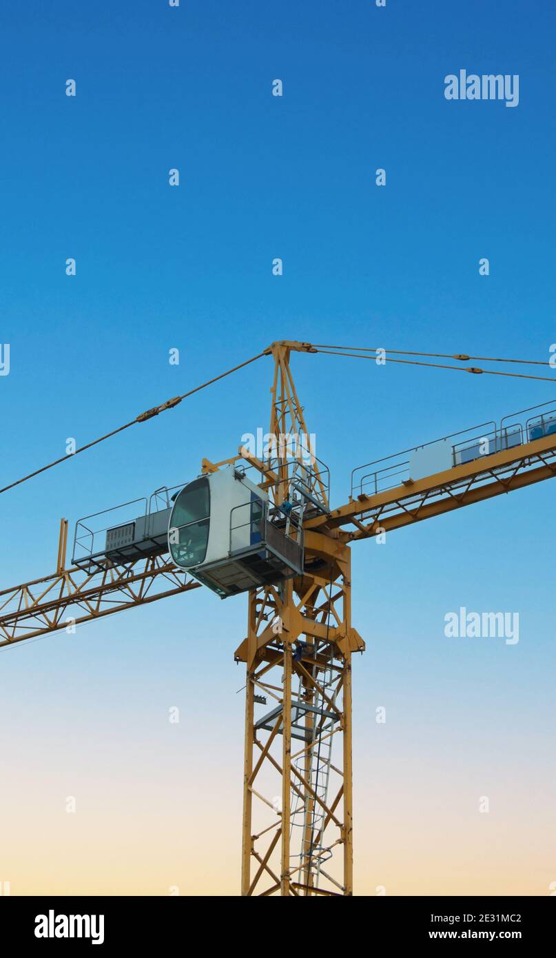 Construction crane on the isolated background of the sky Stock Photo ...