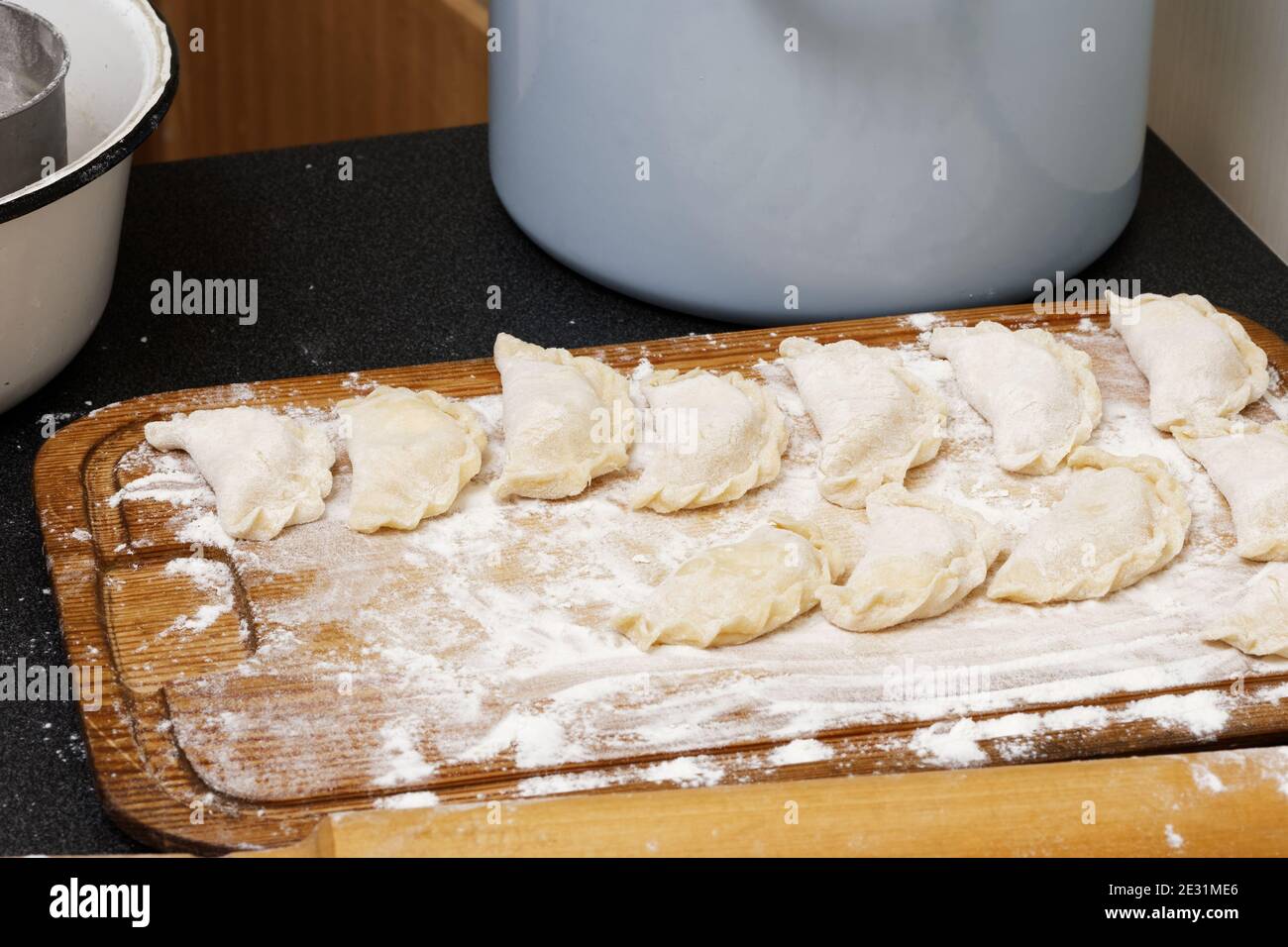 Cooking vareniki - Ukrainian traditional dumplings with cottage cheese ...