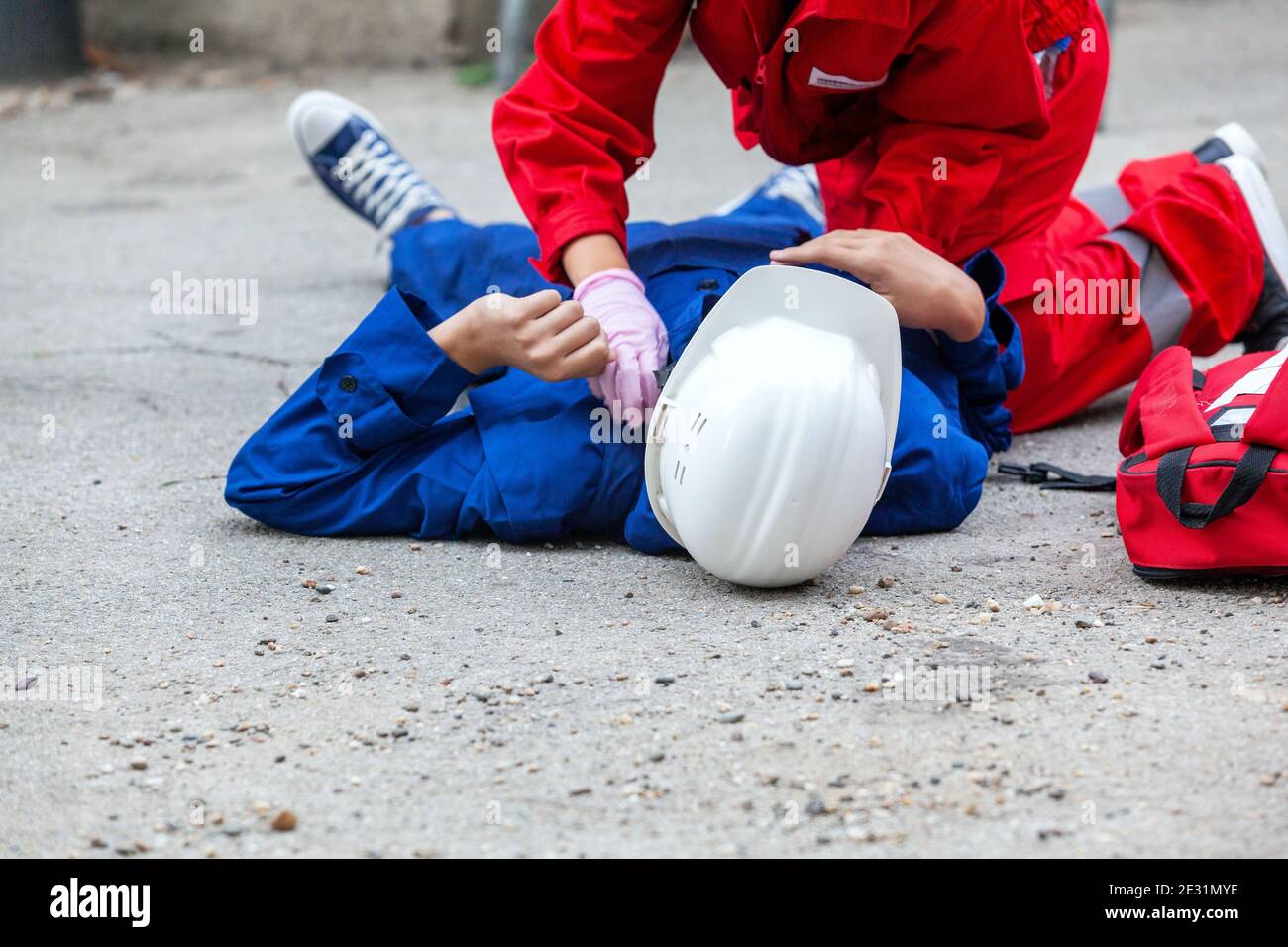 First aid after workplace or accident on work at construction site ...
