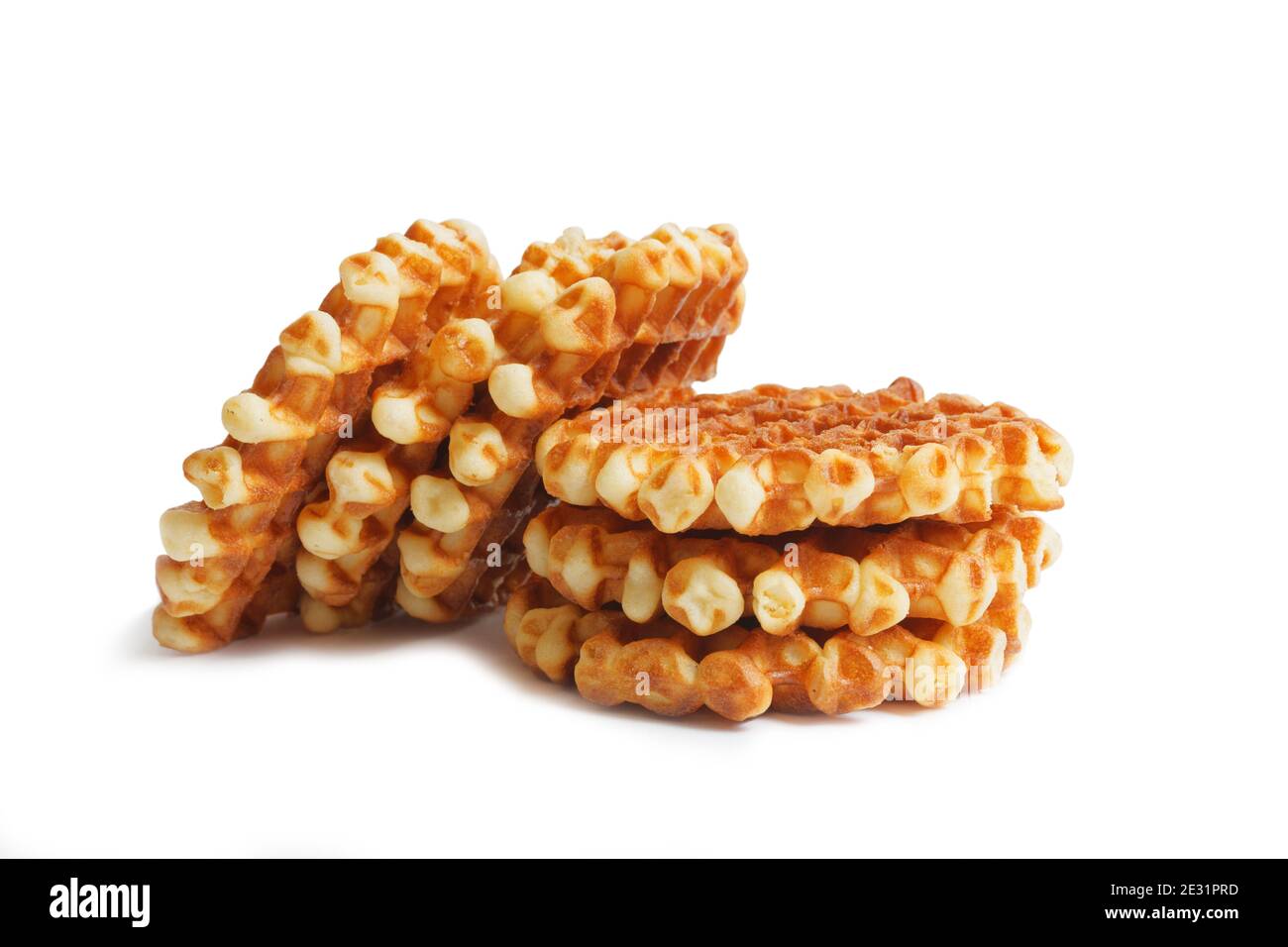 Stack of soft round waffles isolated on white background with shadow ...