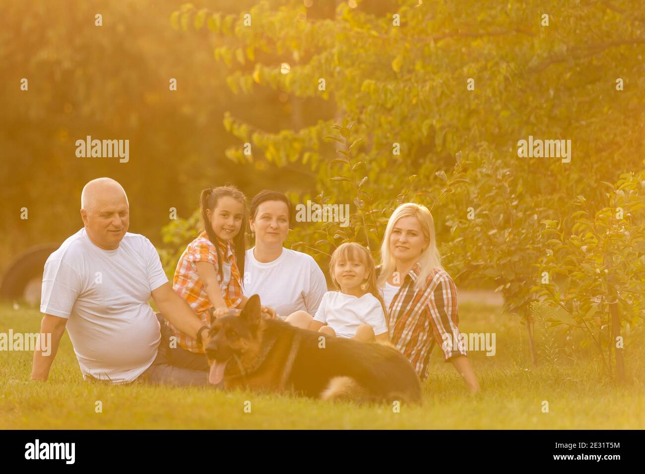 Family Walking Dog Togetherness Nature Concept Stock Photo - Alamy