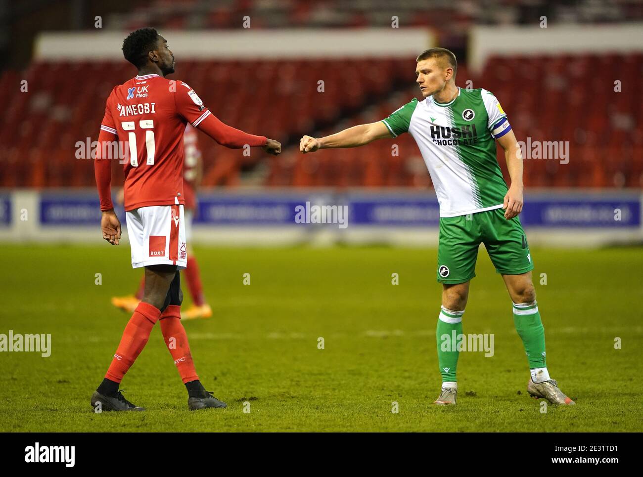 Nottingham Forest's Sammy Ameobi (left) and Millwall's Shaun Hutchinson ...