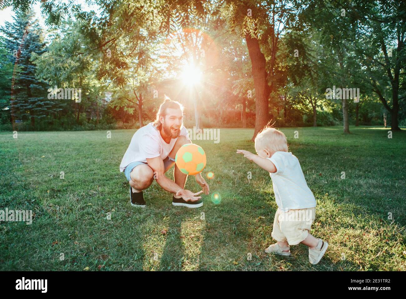 Father and son playing catch hi-res stock photography and images - Alamy