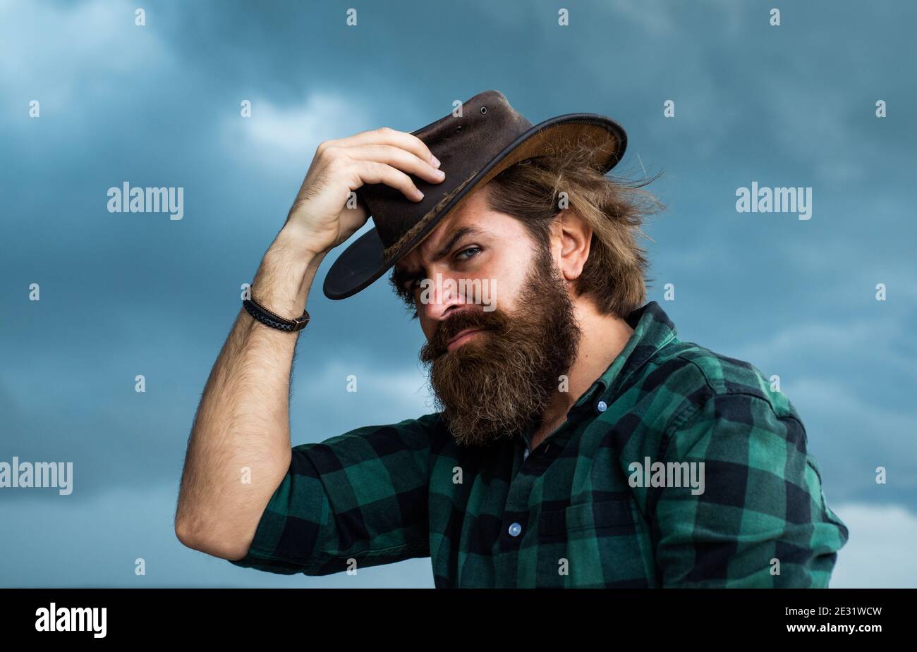 Hair like fire. cowboy bearded man in checkered shirt. hairdresser ...