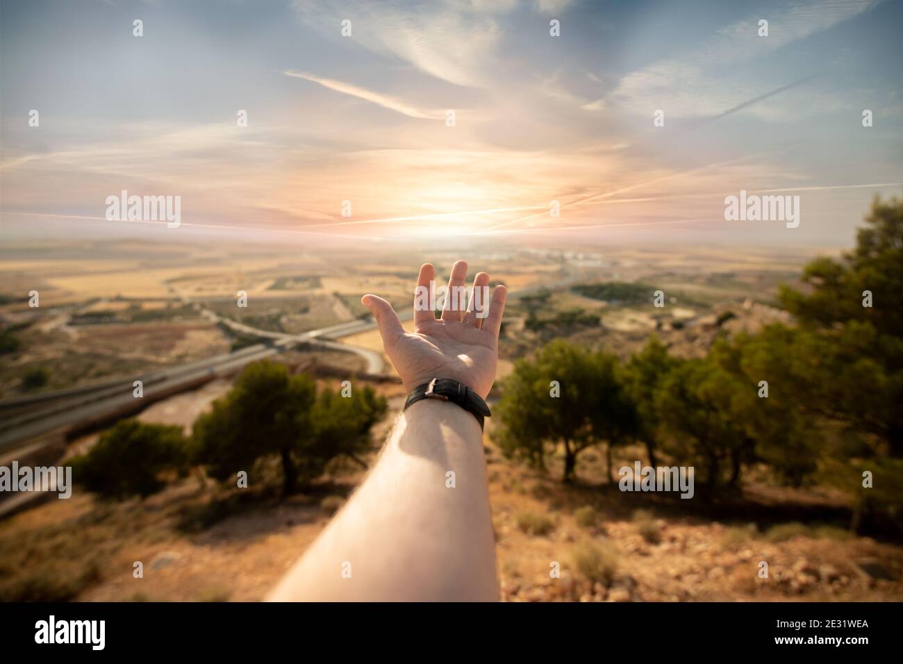 man showing the world with his hand Stock Photo - Alamy