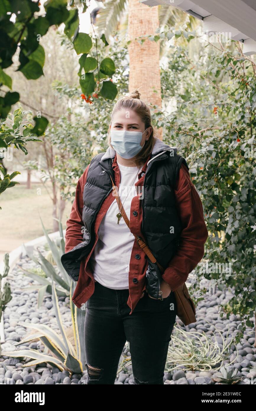 Smiling under mask hi-res stock photography and images - Alamy