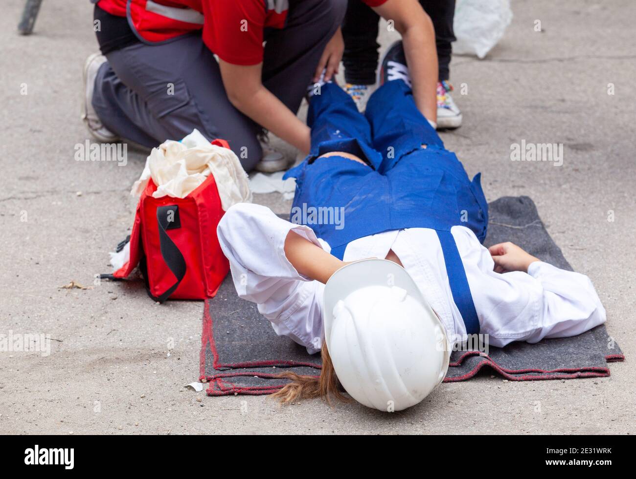 Work or workplace accident at construction site. First aid and ...