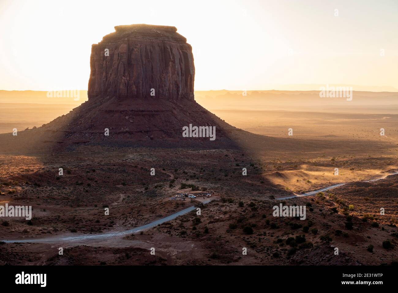 The famous and iconic Merrick Butte rock formation backlit at sunrise ...