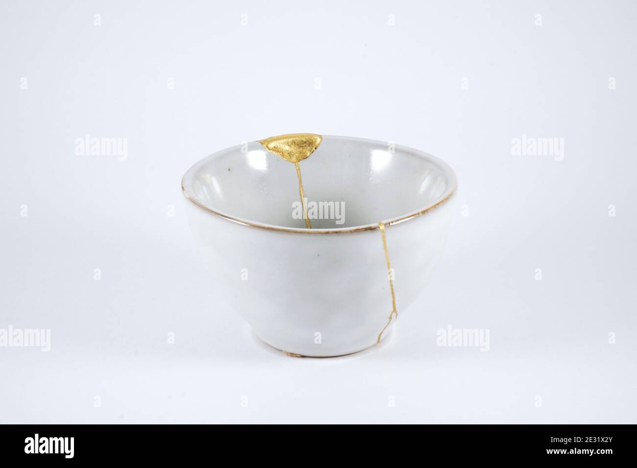 Gray Kintsugi bowl, real gold restoration, japanese technique Stock ...