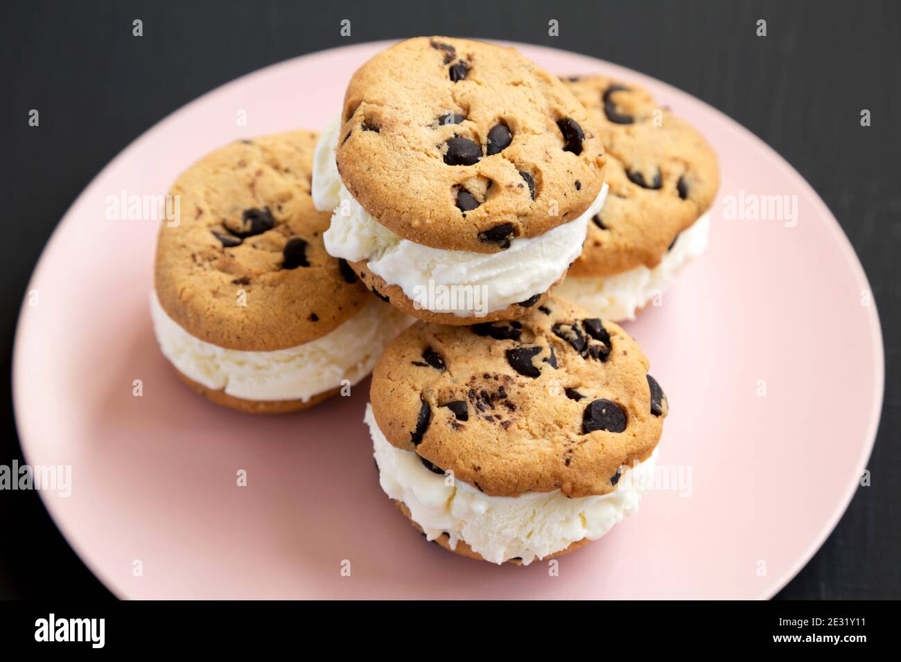 Homemade Chocolate Chip Cookie Ice Cream Sandwich on a pink plate on a ...