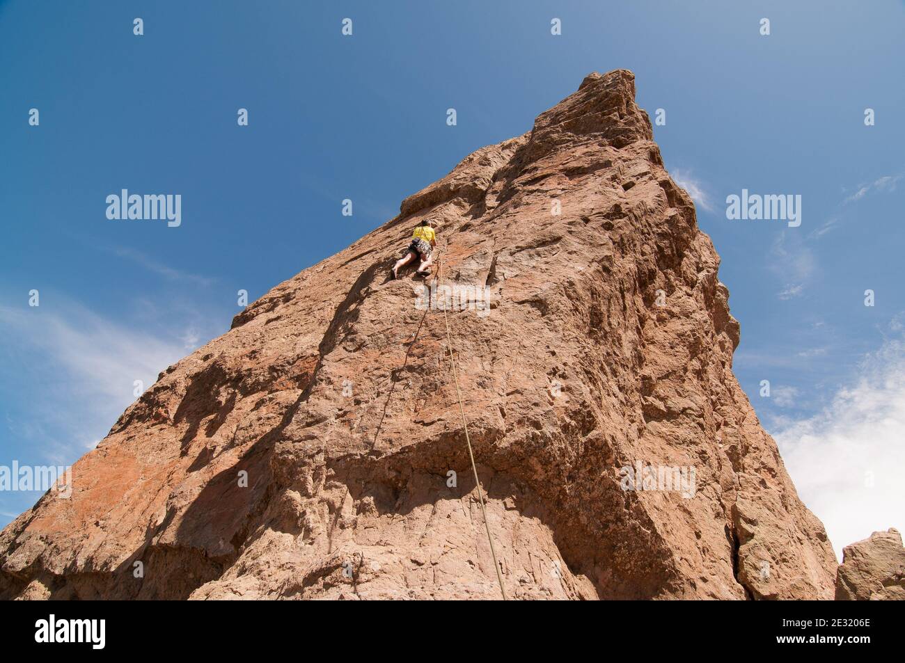 Small Cliff Climber in Sunshine Stock Photo - Alamy