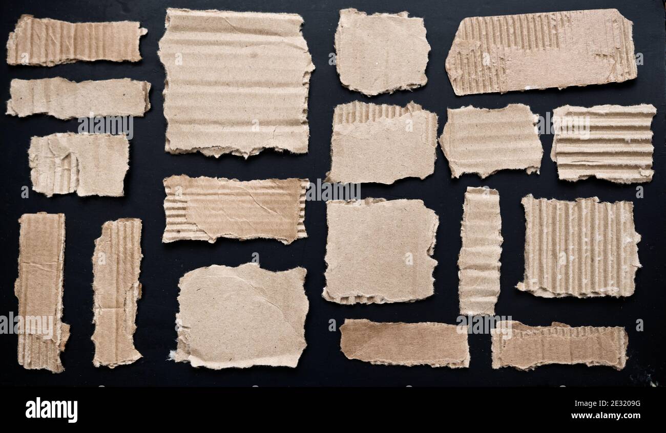 Cardboard scraps isoalted on white background Stock Photo - Alamy