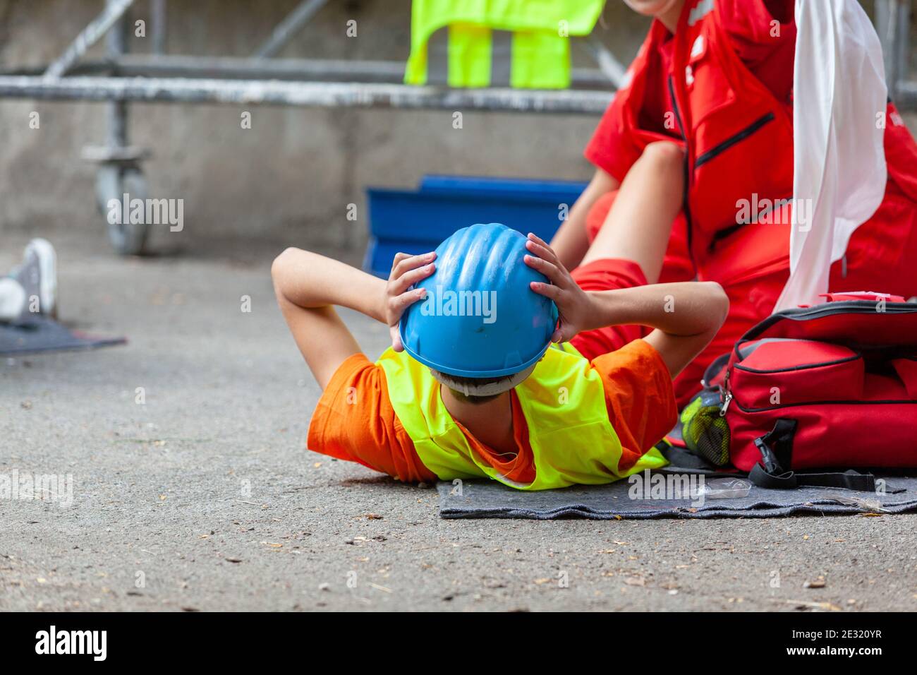 Work or workplace accident at construction site. First aid and ...
