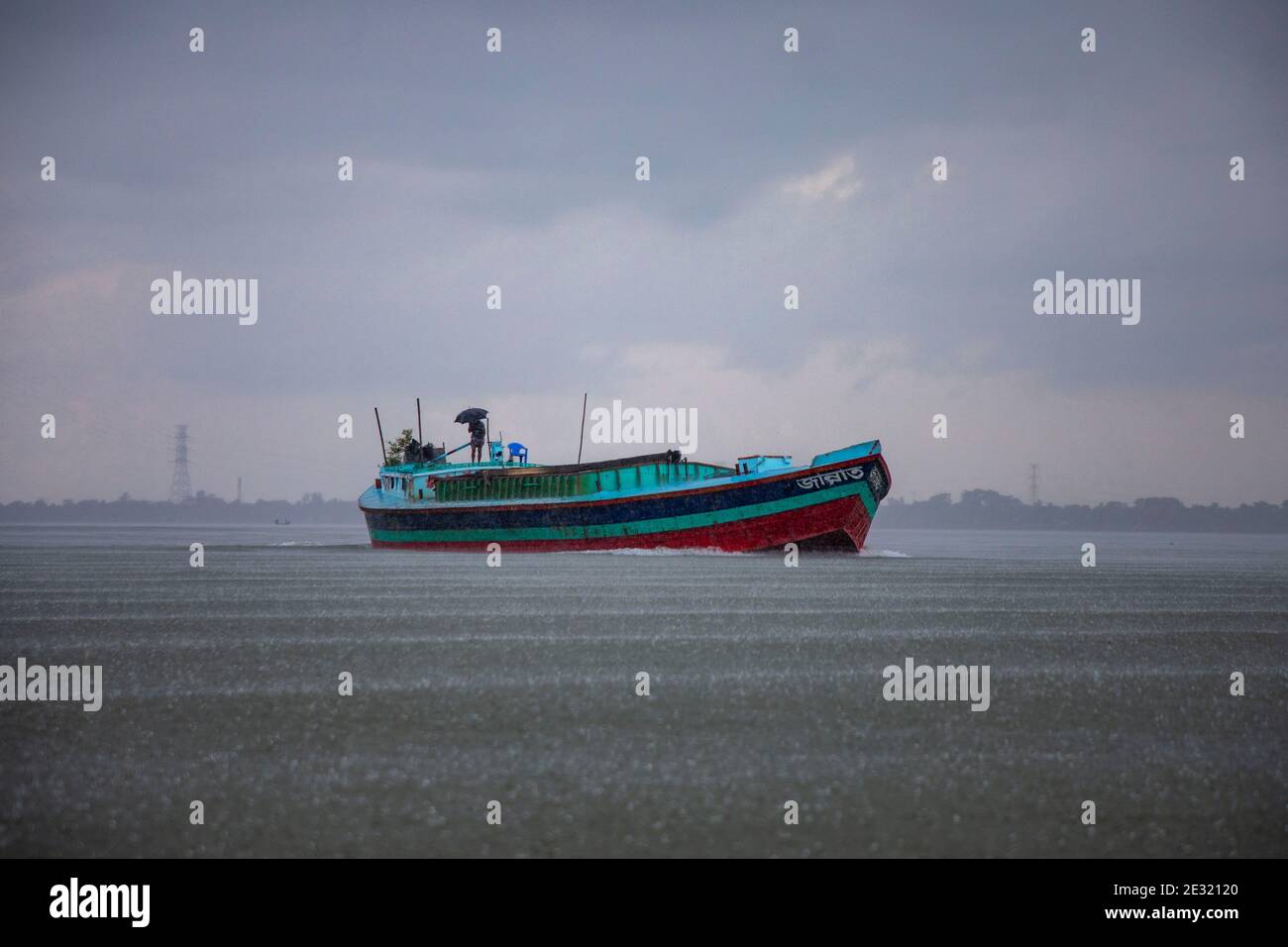 Bulkhead ship on the Meghna River during heavey rain at Ashuganj ...