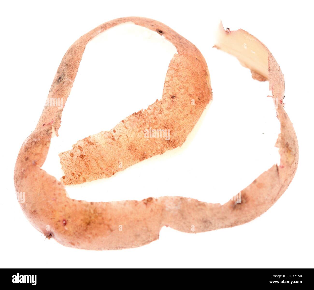 Potato peel isolated on white background Stock Photo - Alamy