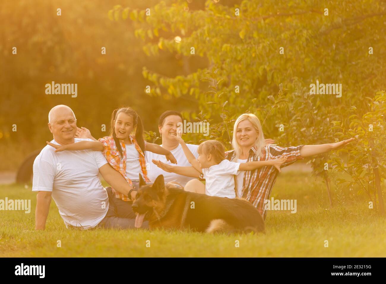 Family Walking Dog Togetherness Nature Concept Stock Photo - Alamy