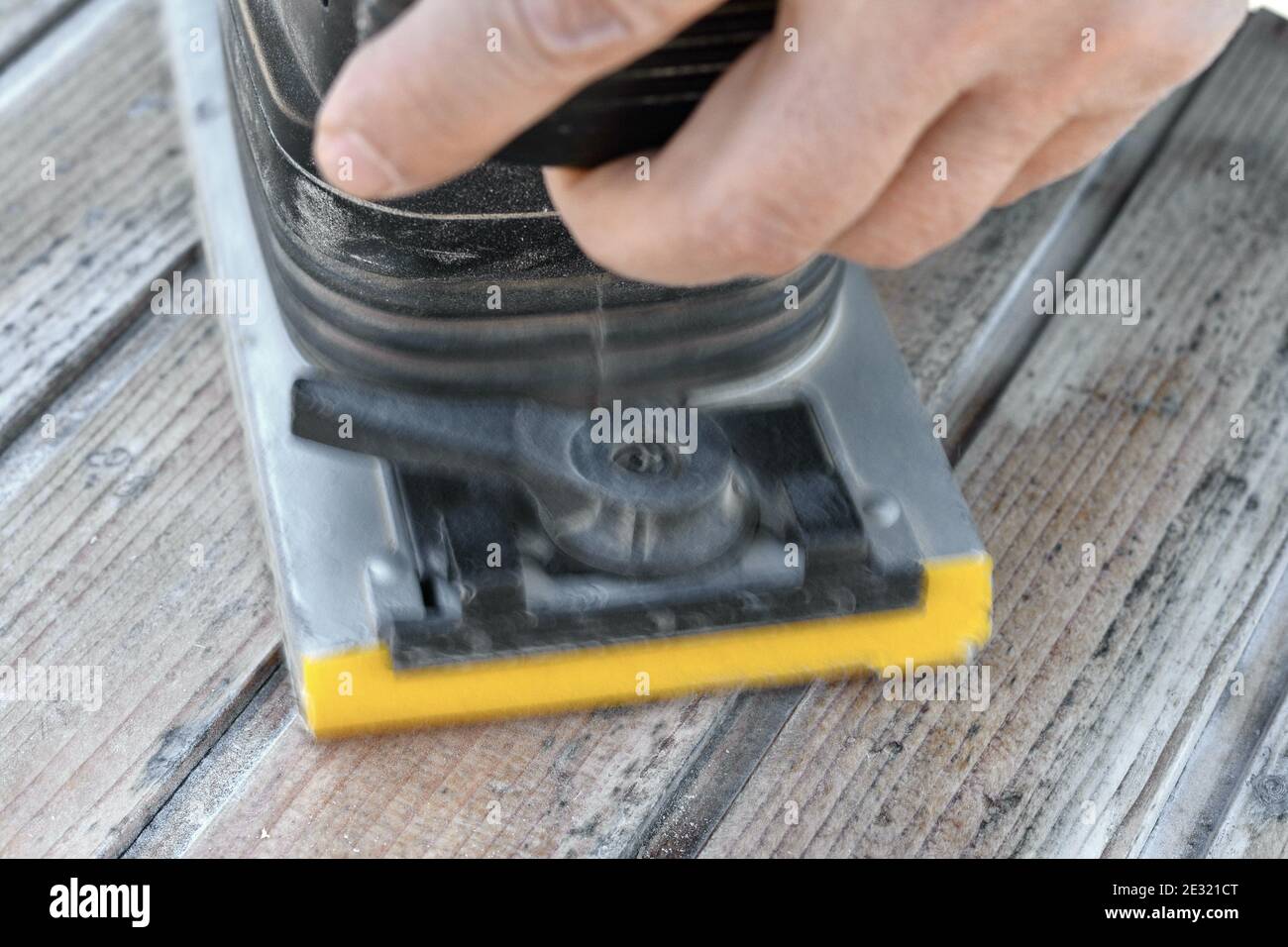 The polished wood working. Carpenter workspace refining the surface of ...