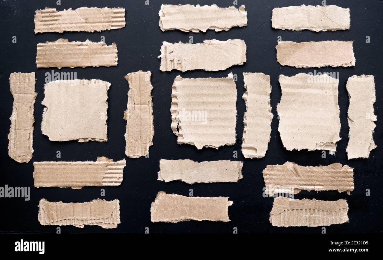 Cardboard scraps isoalted on white background Stock Photo - Alamy