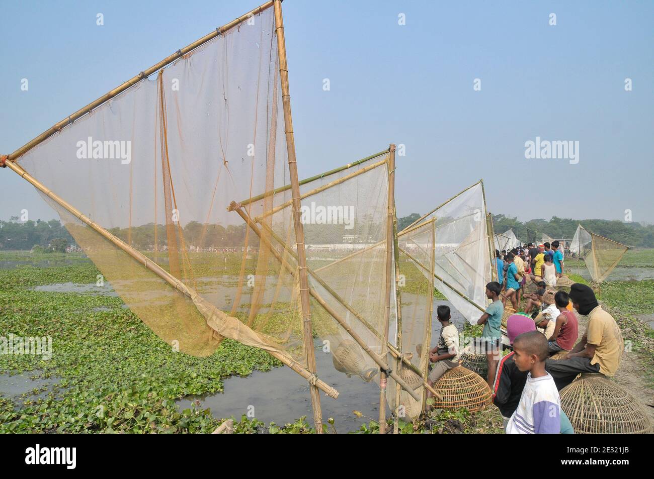 Children catching fish bangladesh hi-res stock photography and images ...