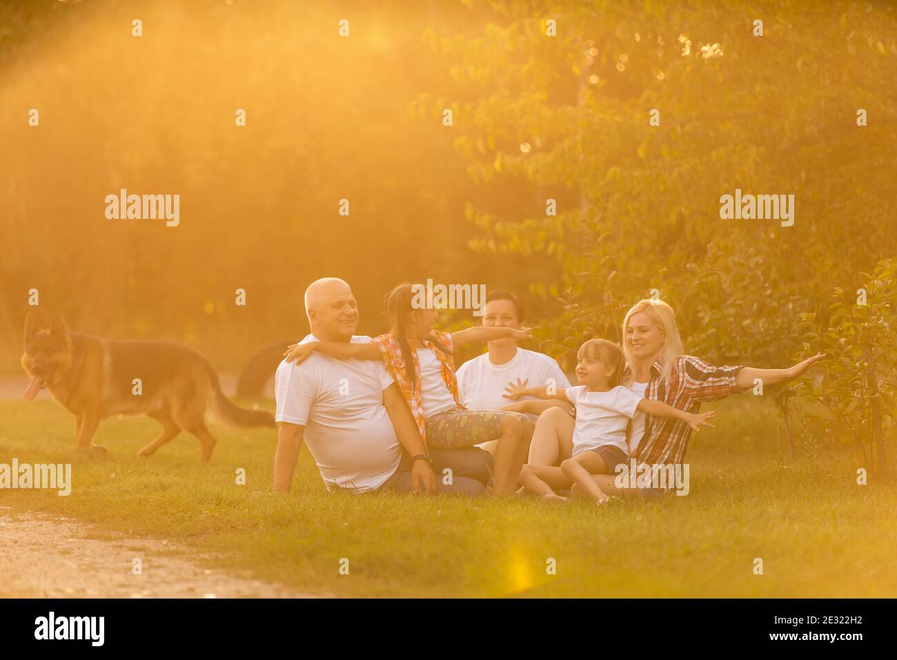 Family Walking Dog Togetherness Nature Concept Stock Photo - Alamy