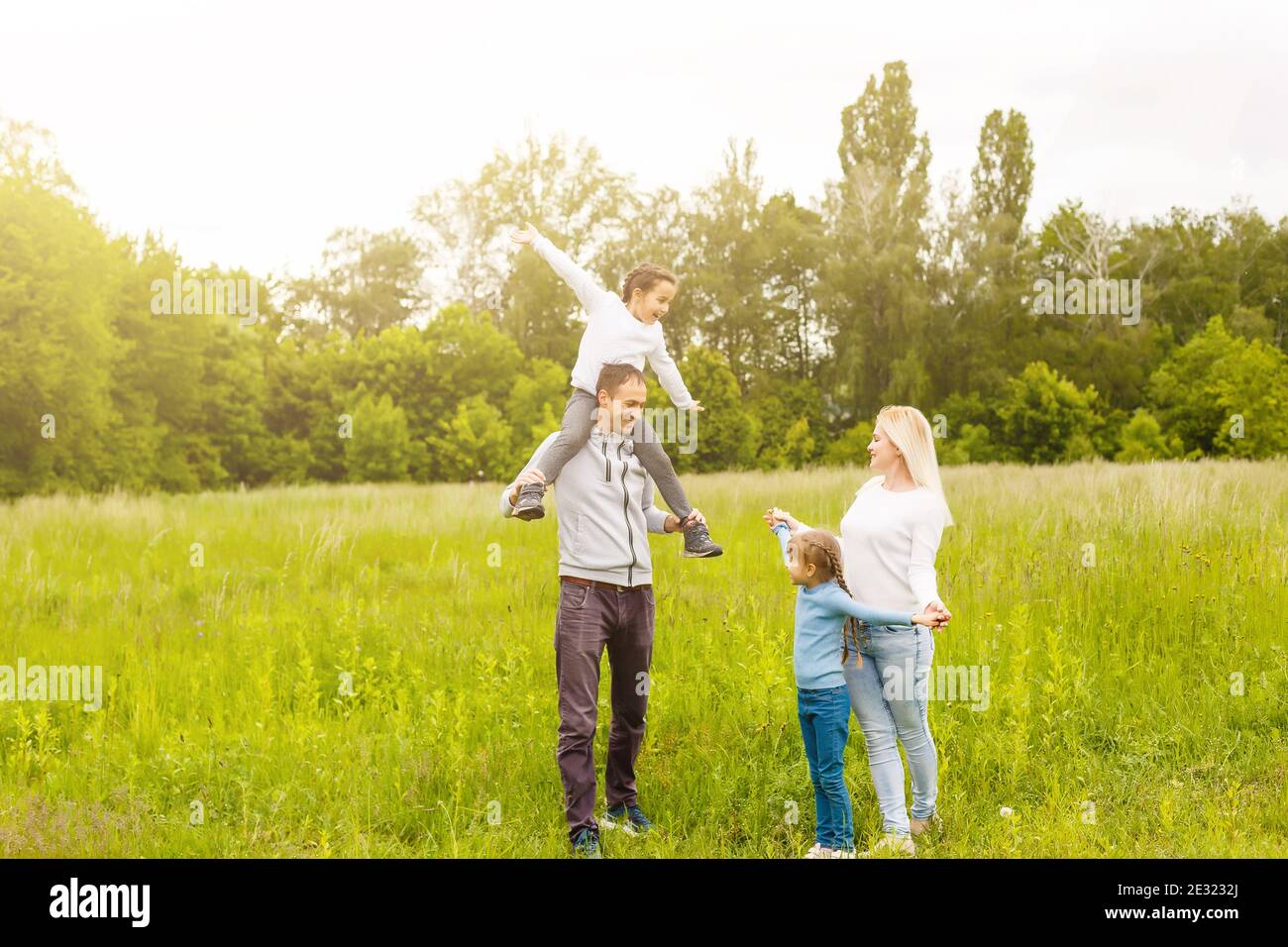 Family two children enjoying walk hi-res stock photography and images ...