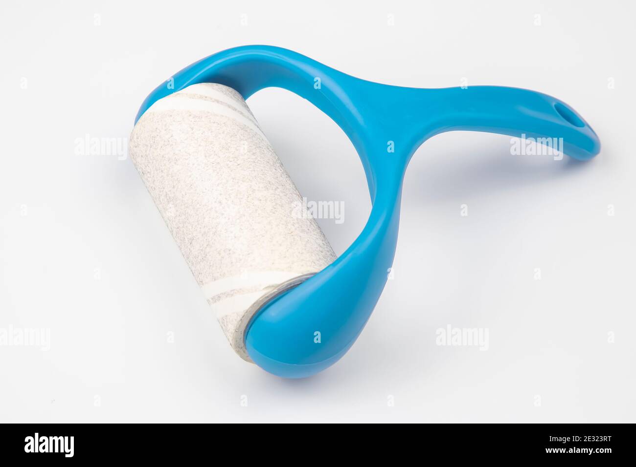 sticky plastic roller for cleaning clothes from dust, lint and hair on ...