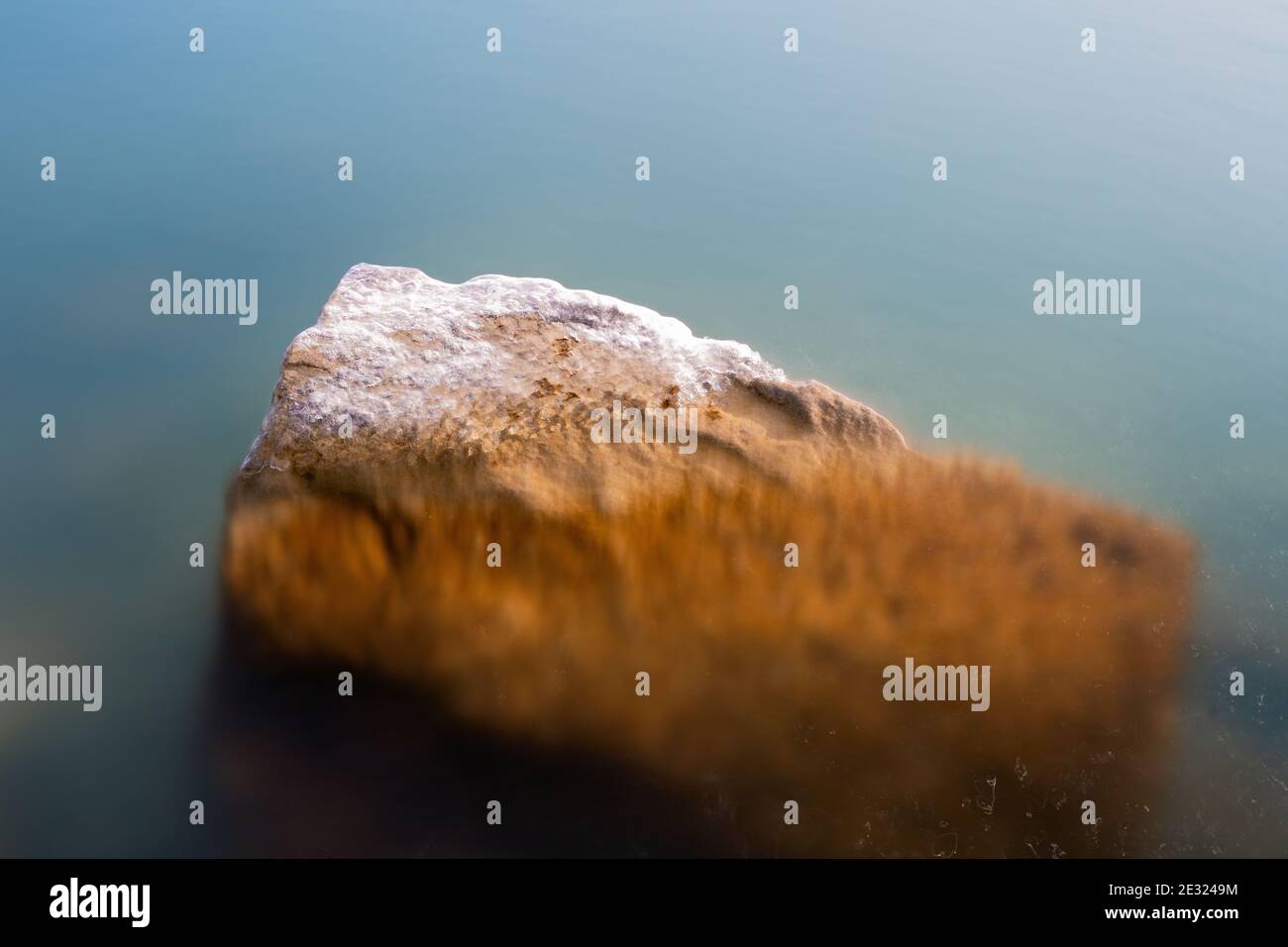 Rock in Lake Michigan Stock Photo - Alamy