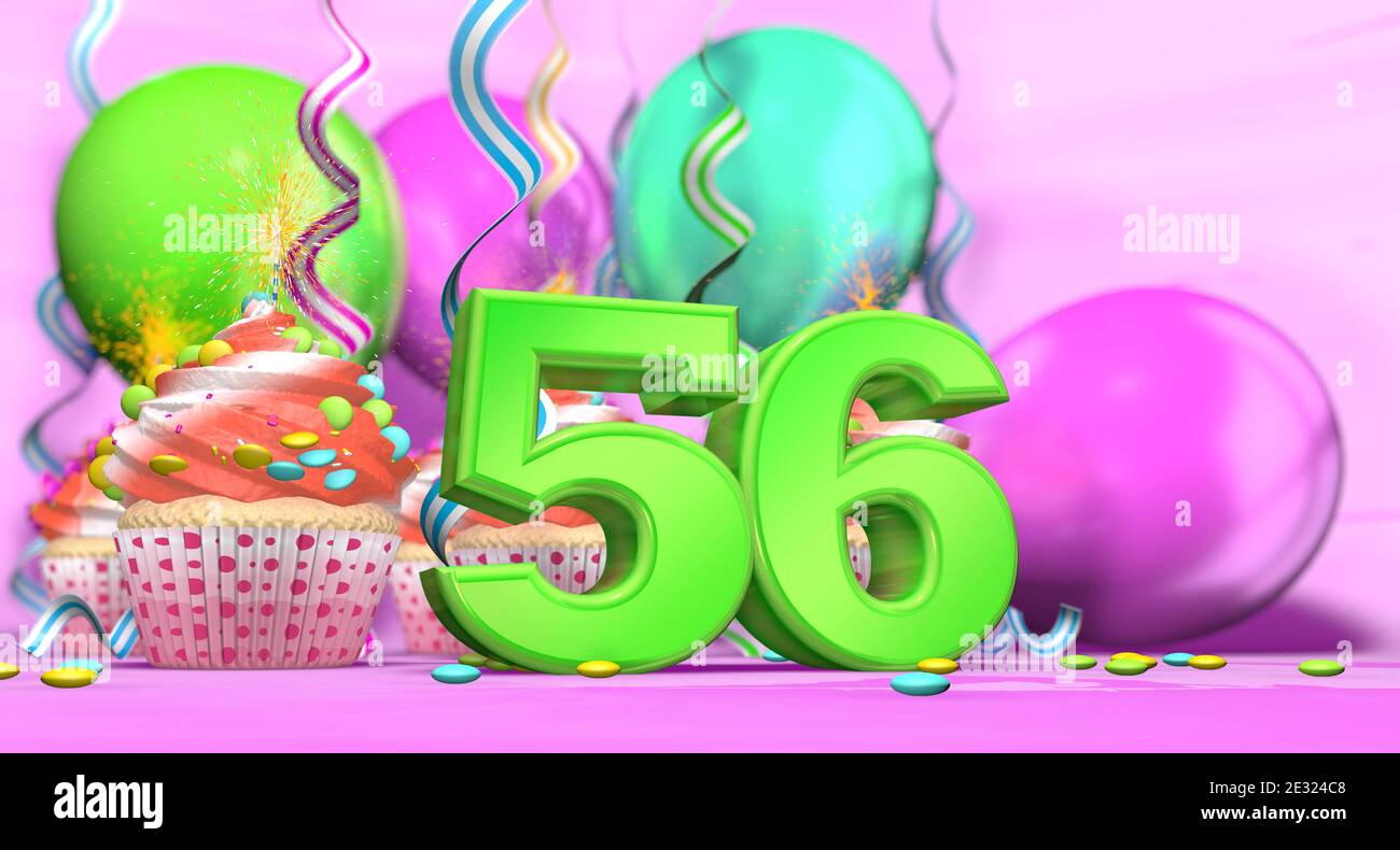 Birthday cupcake with sparking candle with the number 56 large in green ...