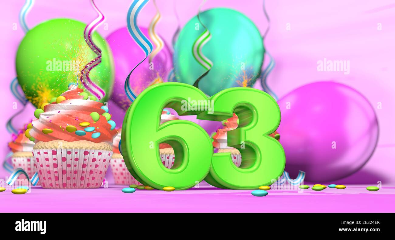 Birthday cupcake with sparking candle with the number 63 large in green ...