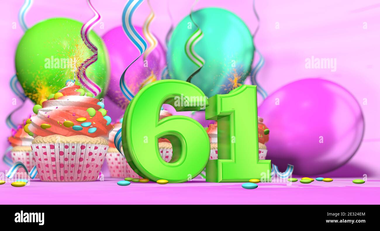 Birthday cupcake with sparking candle with the number 61 large in green ...