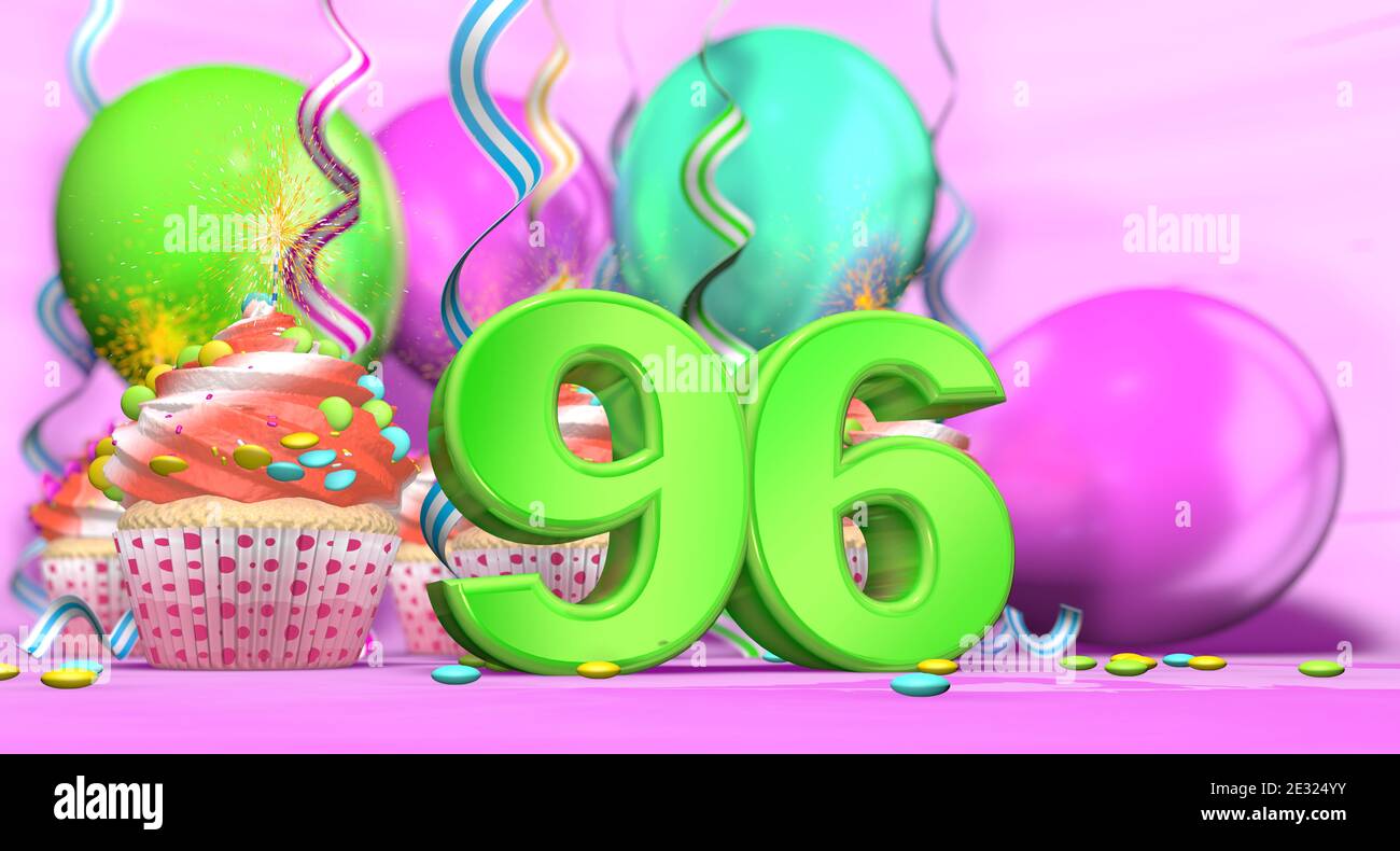 Birthday cupcake with sparking candle with the number 96 large in green ...