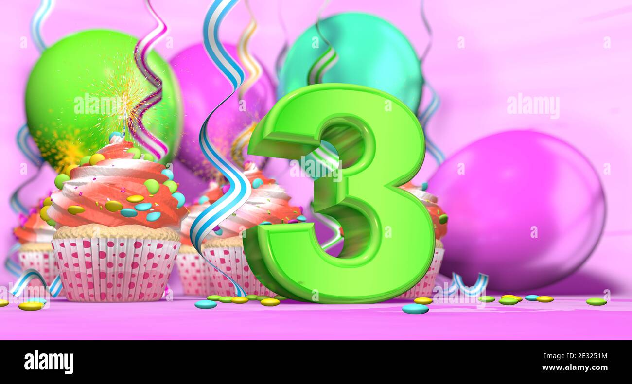 Birthday cupcake with sparking candle with the number 3 large in green ...