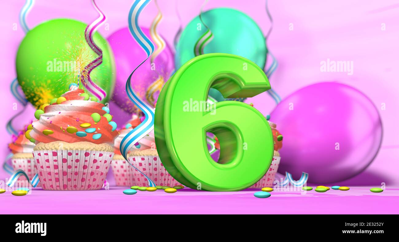 Birthday cupcake with sparking candle with the number 6 large in green ...