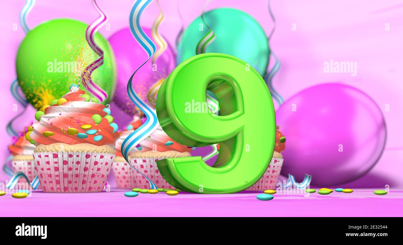 Birthday cupcake with sparking candle with the number 9 large in green ...