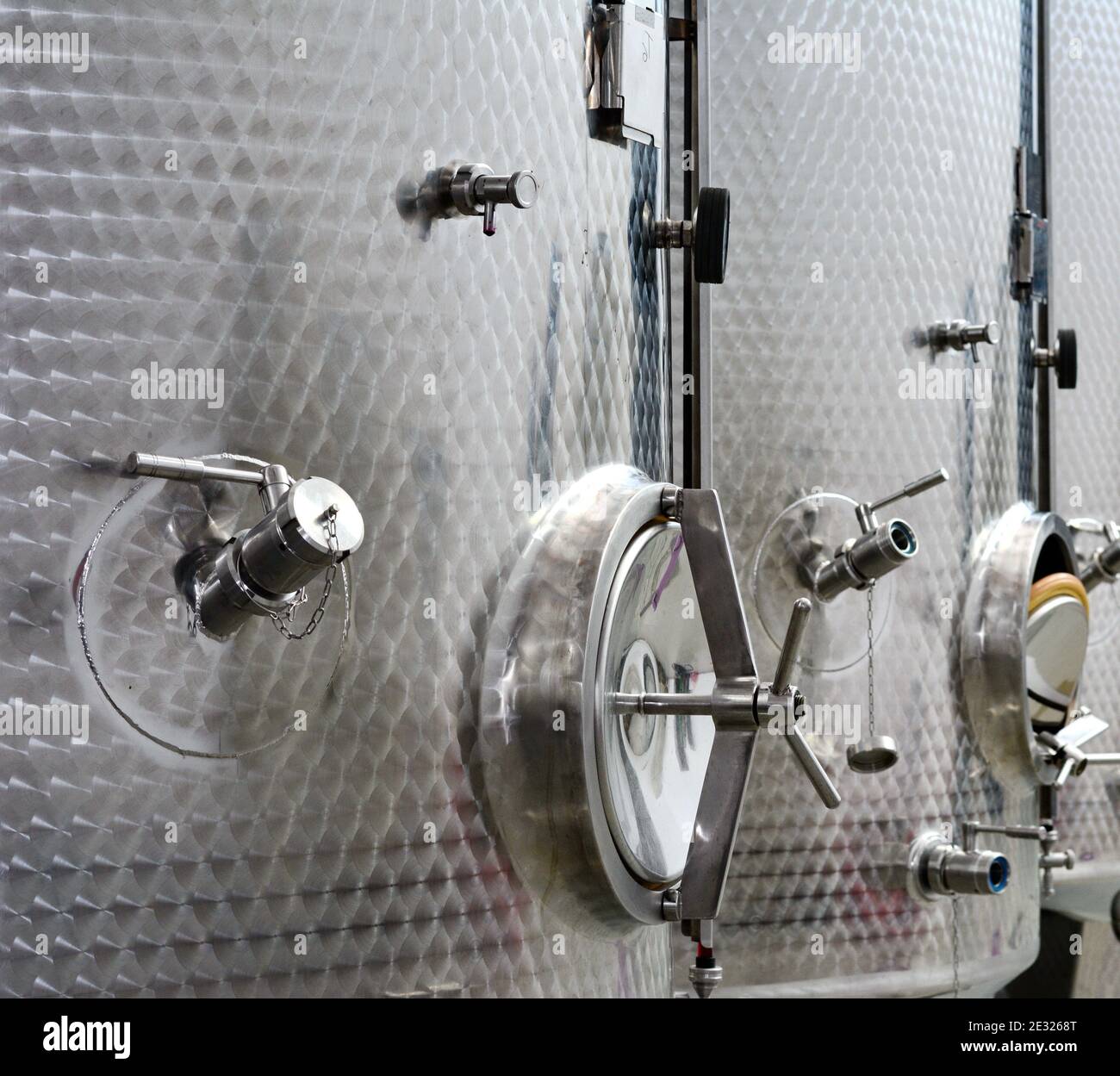 Modern wine factory with new large tanks for the fermentation. modern ...