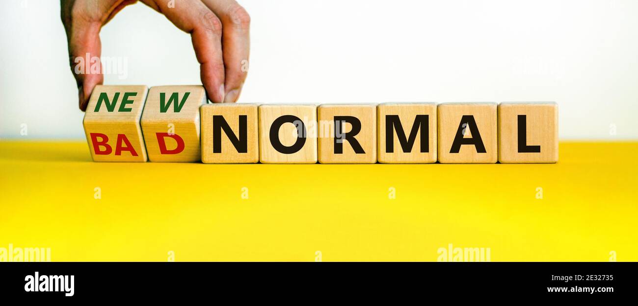 New vs bad normal symbol. Businessman turns wooden cubes and changes ...