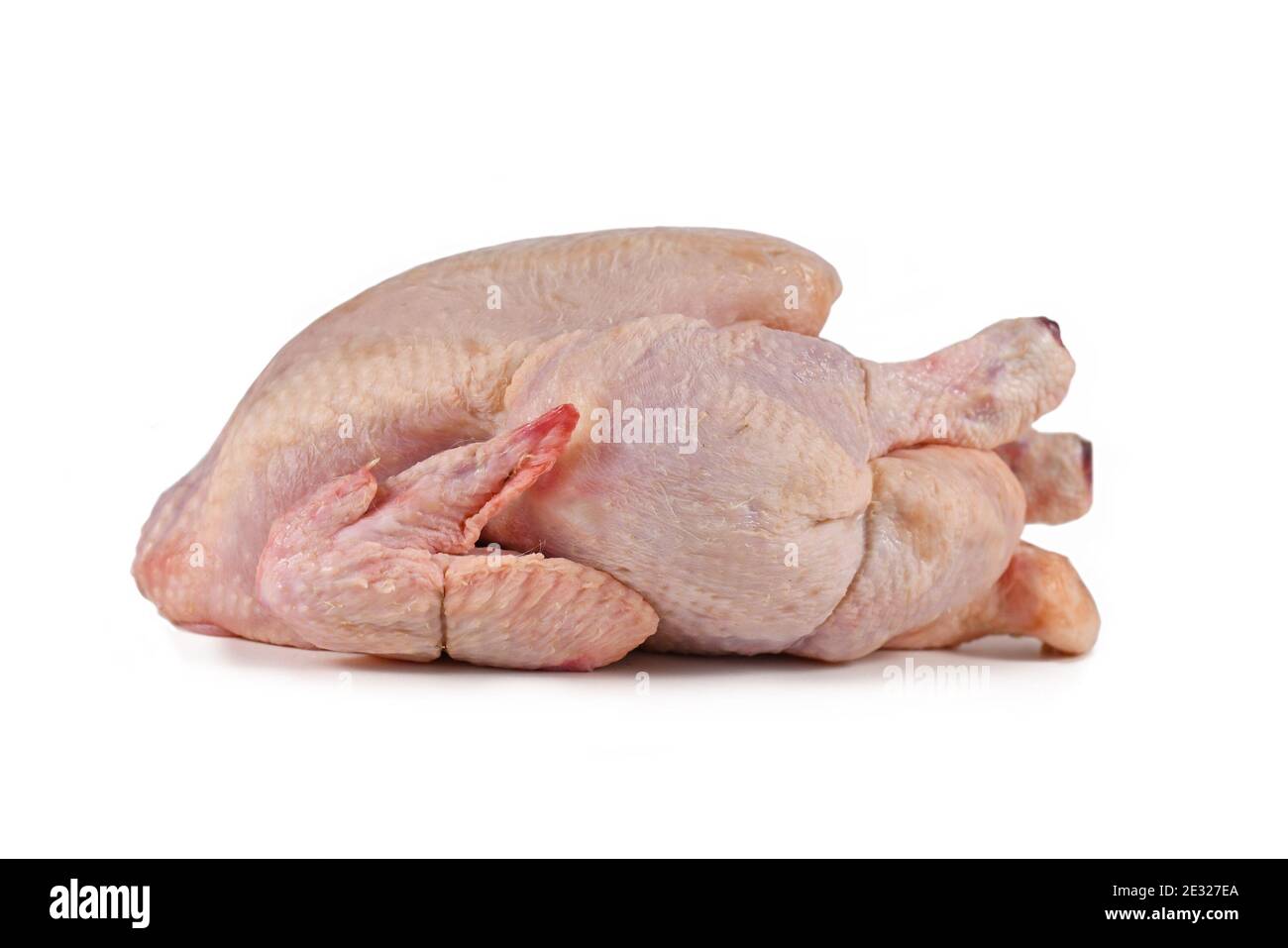 Whole raw chicken isolated on white background Stock Photo - Alamy