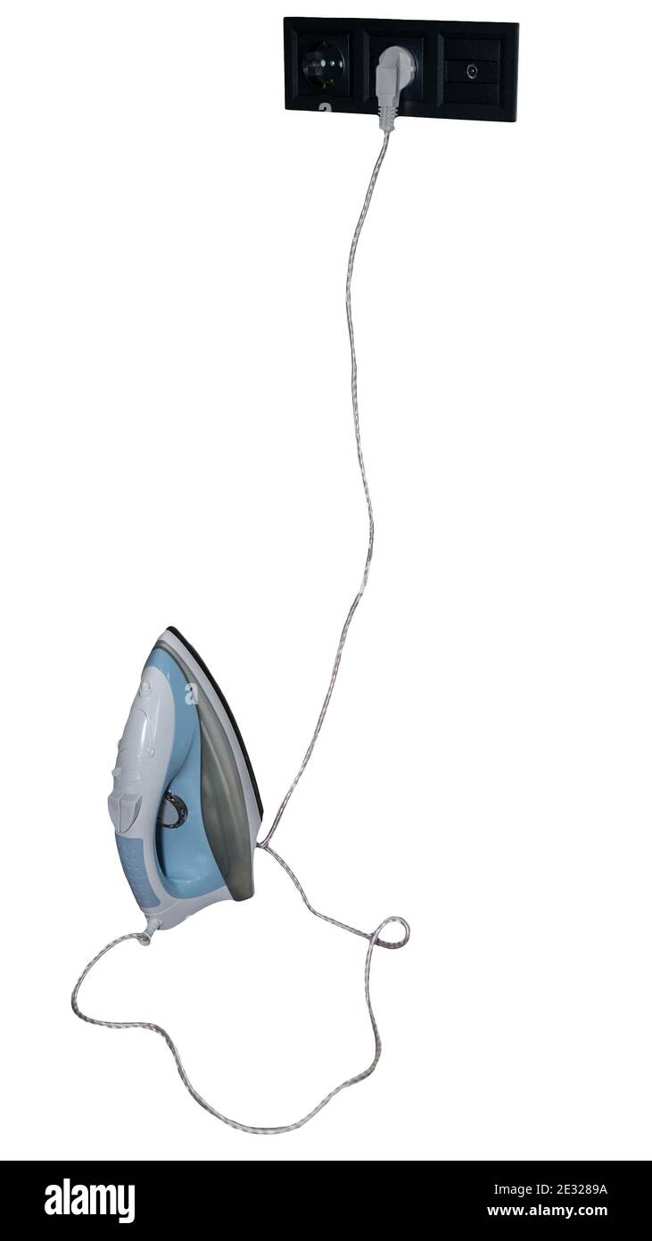 The iron is powered from an electrical outlet isolated on a white ...