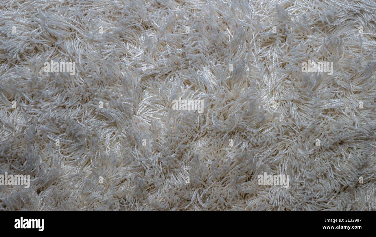 The background of a fleecy carpet, lowercase threads, the texture of a ...
