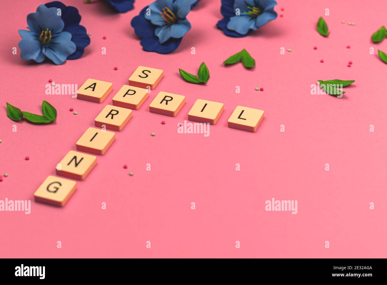 Spring april month lettering flat lay background, concept with a ...