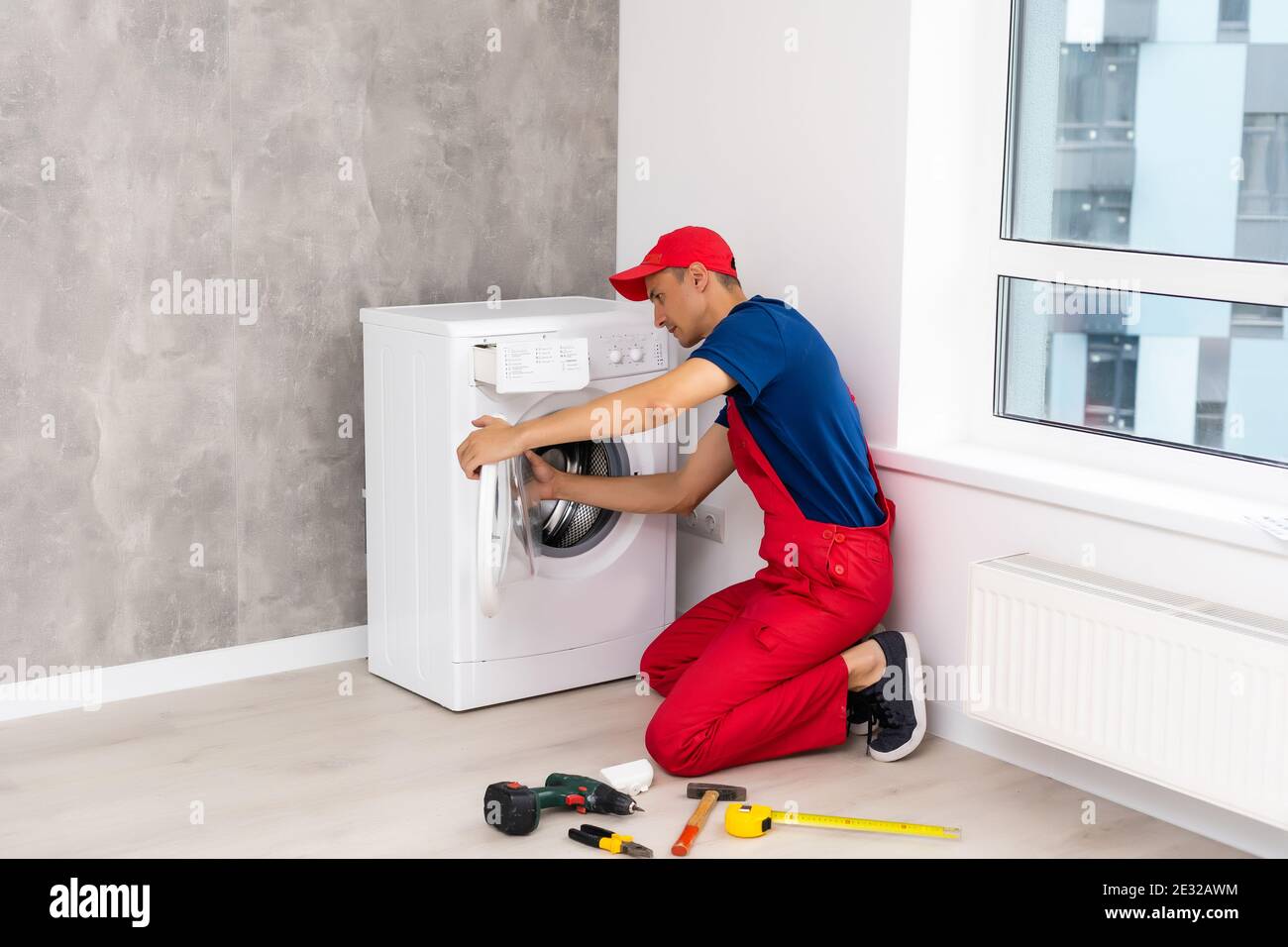 Fixing broken appliance manual hi-res stock photography and images - Alamy