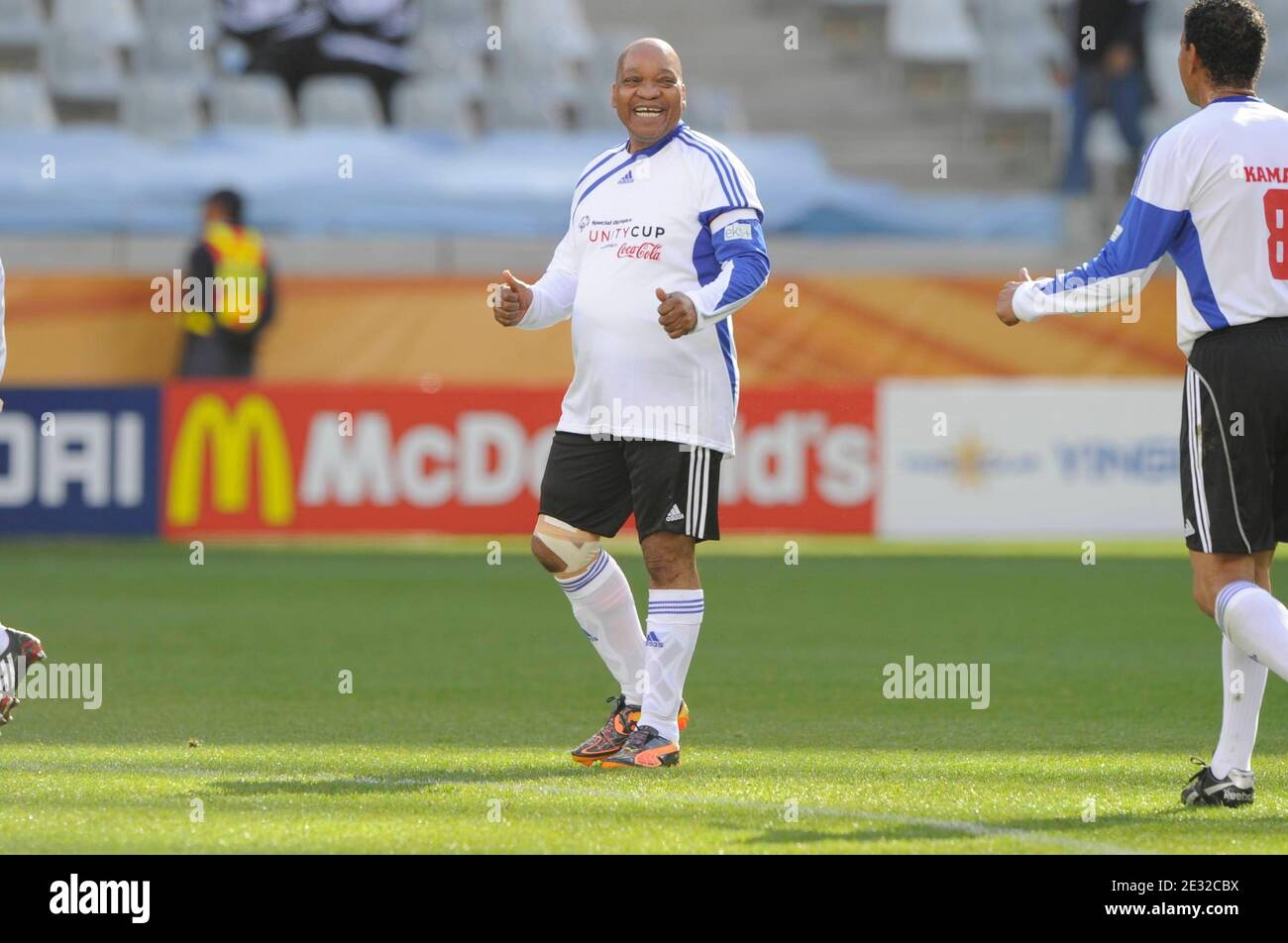 South Africa president Jacob Zuma plays football for a charity action ...