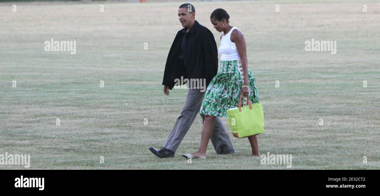 President Barack Obama and First Lady Michelle Obama arrive at Fort ...