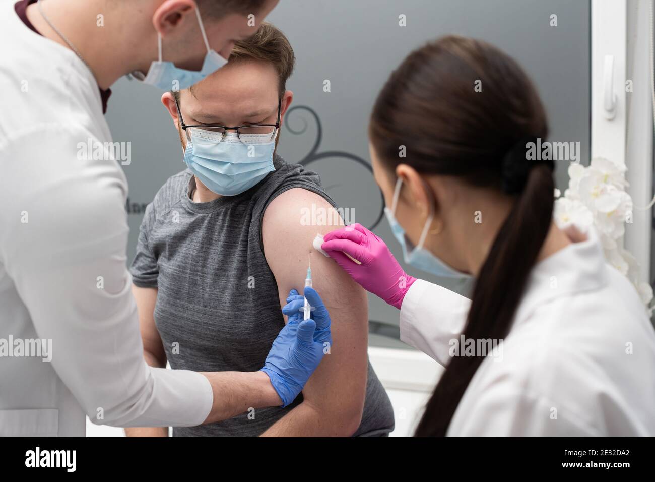 A young medical apprentice learns to administer injections under the ...